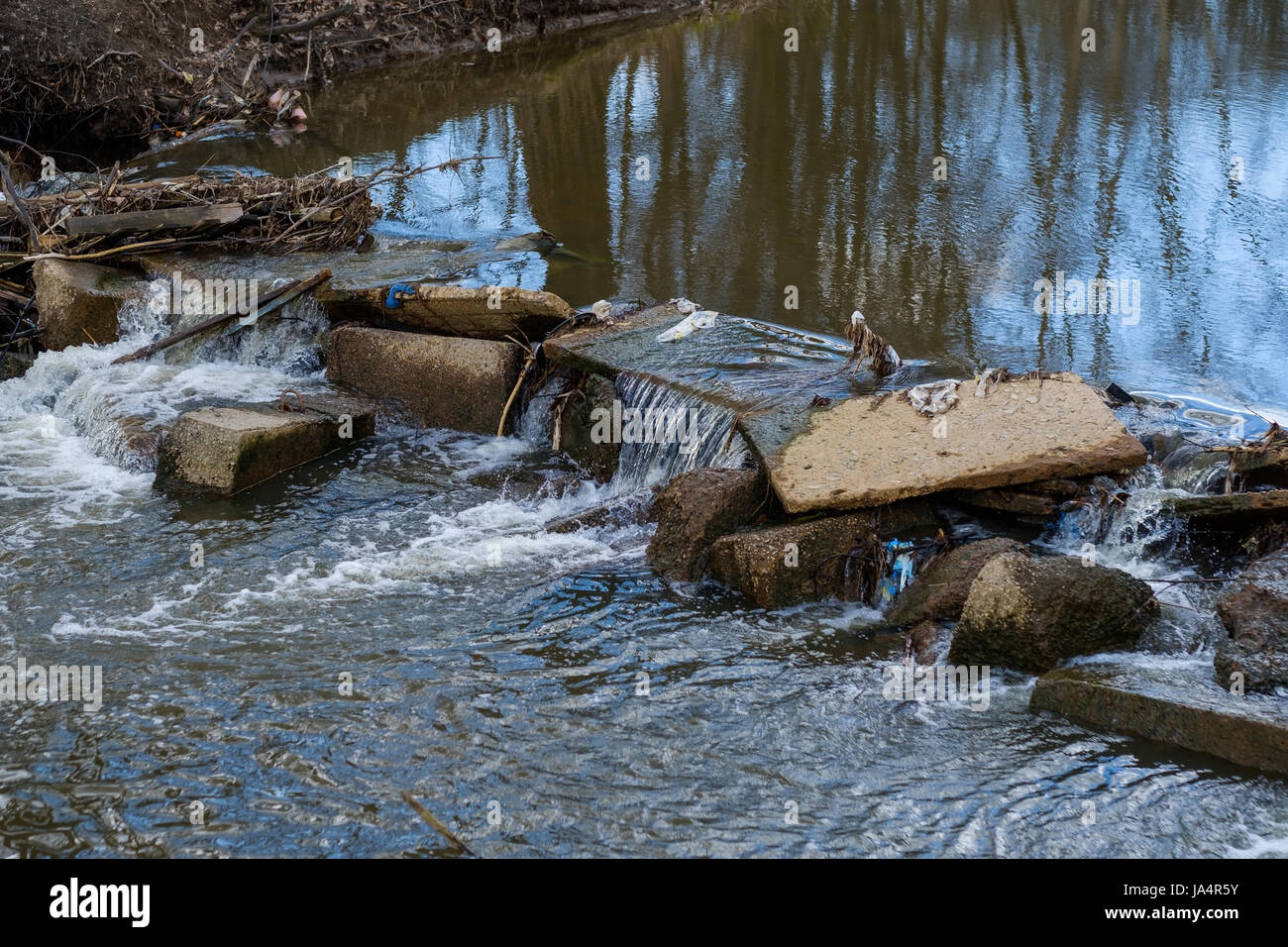 A gully of stones on the creek Stock Photo - Alamy A gully of stones on the creek Stock Photo - Alamy