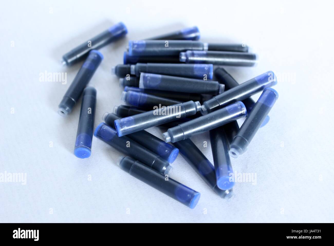 Blue ink cartridges to write with a fountain pen Stock Photo - Alamy