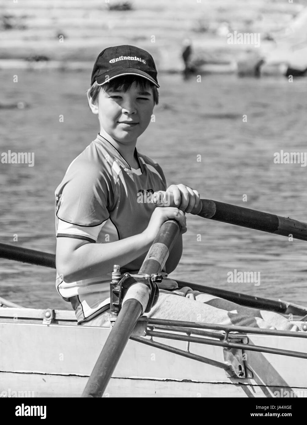 A boy in a row club in Poland. Hard work on a sport form in rowing and ...