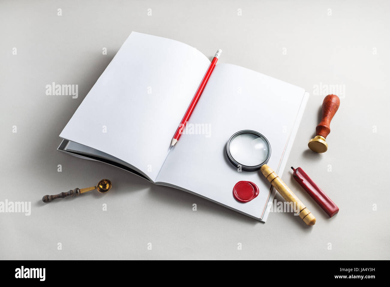 Photo of blank open book and vintage stationery elements on paper ...