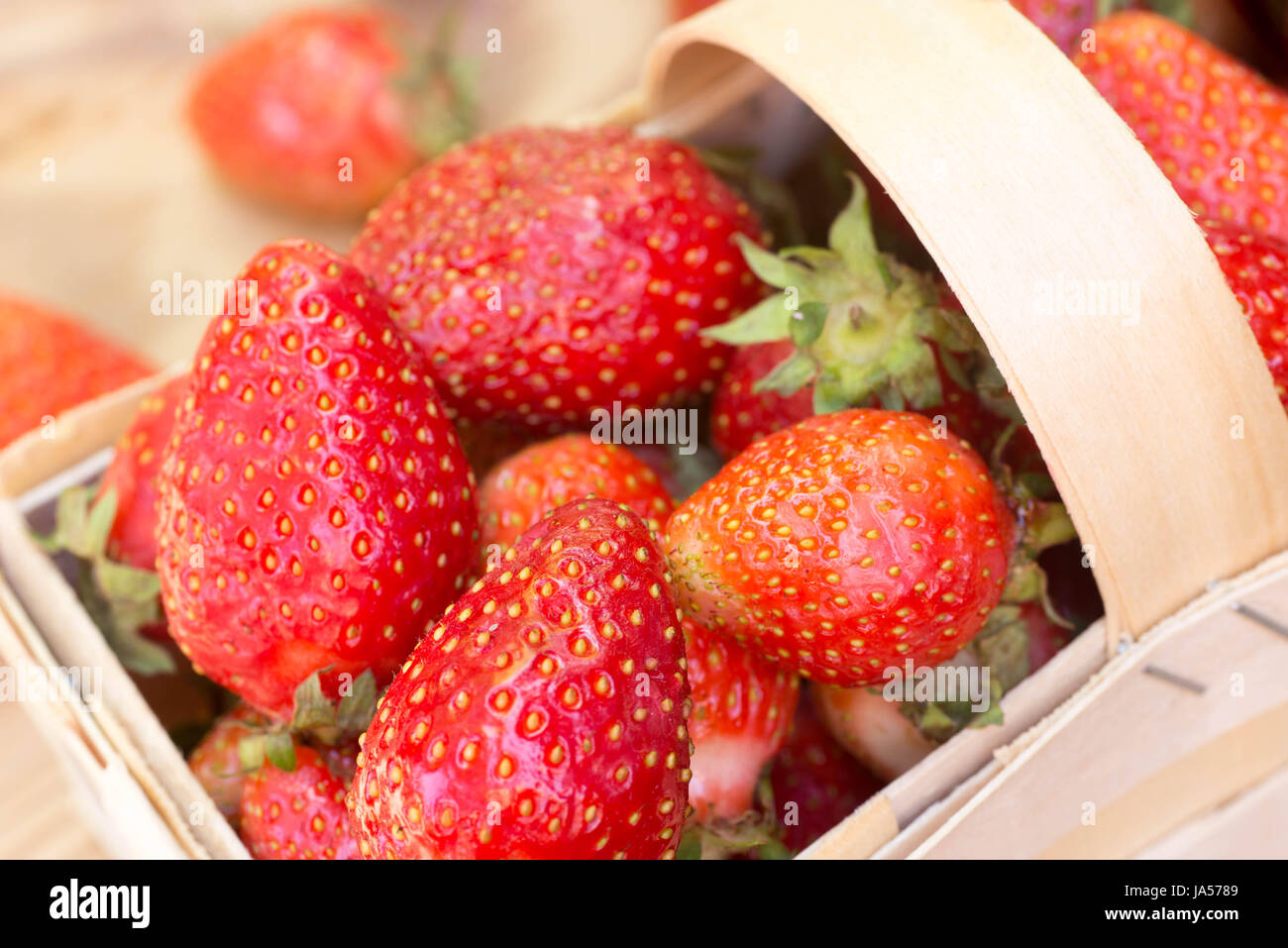 Strawberries in wicker box hi-res stock photography and images - Alamy