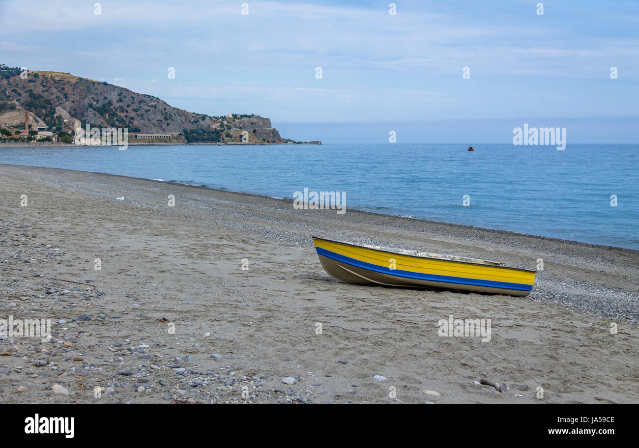 Blue and Yellow boat in a Mediterranean beach of Ionian Sea - Bova ...