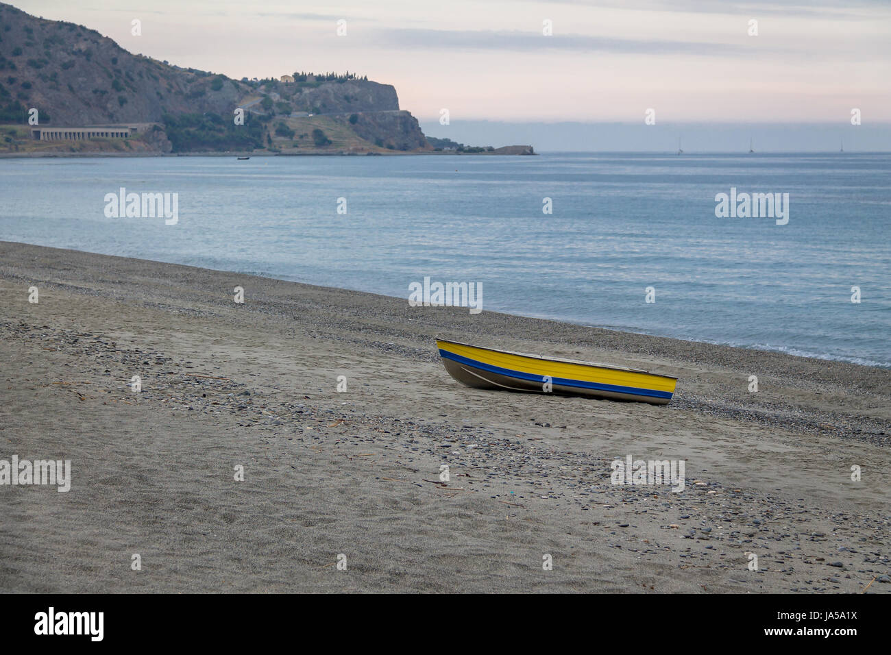 Blue and Yellow boat in a Mediterranean beach of Ionian Sea - Bova ...