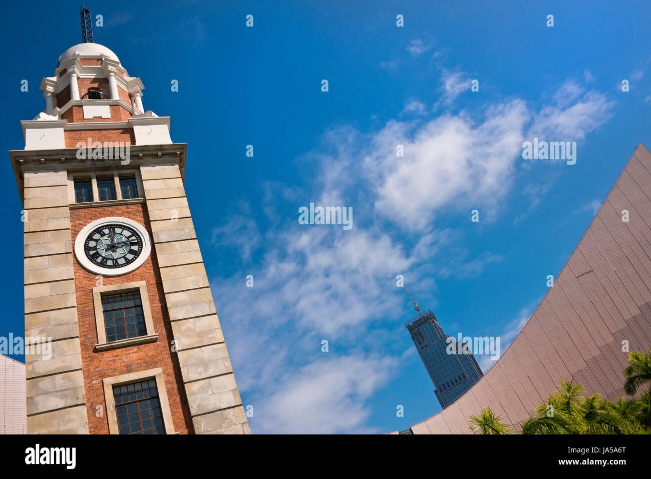 Horizontal view of the iconic clock tower and Hong Kong Cultural Centre ...