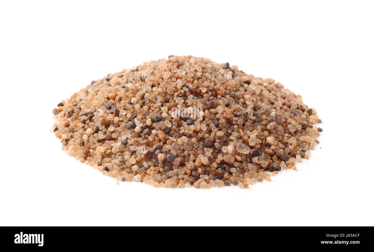 A handful of sand isolated on a white Stock Photo - Alamy