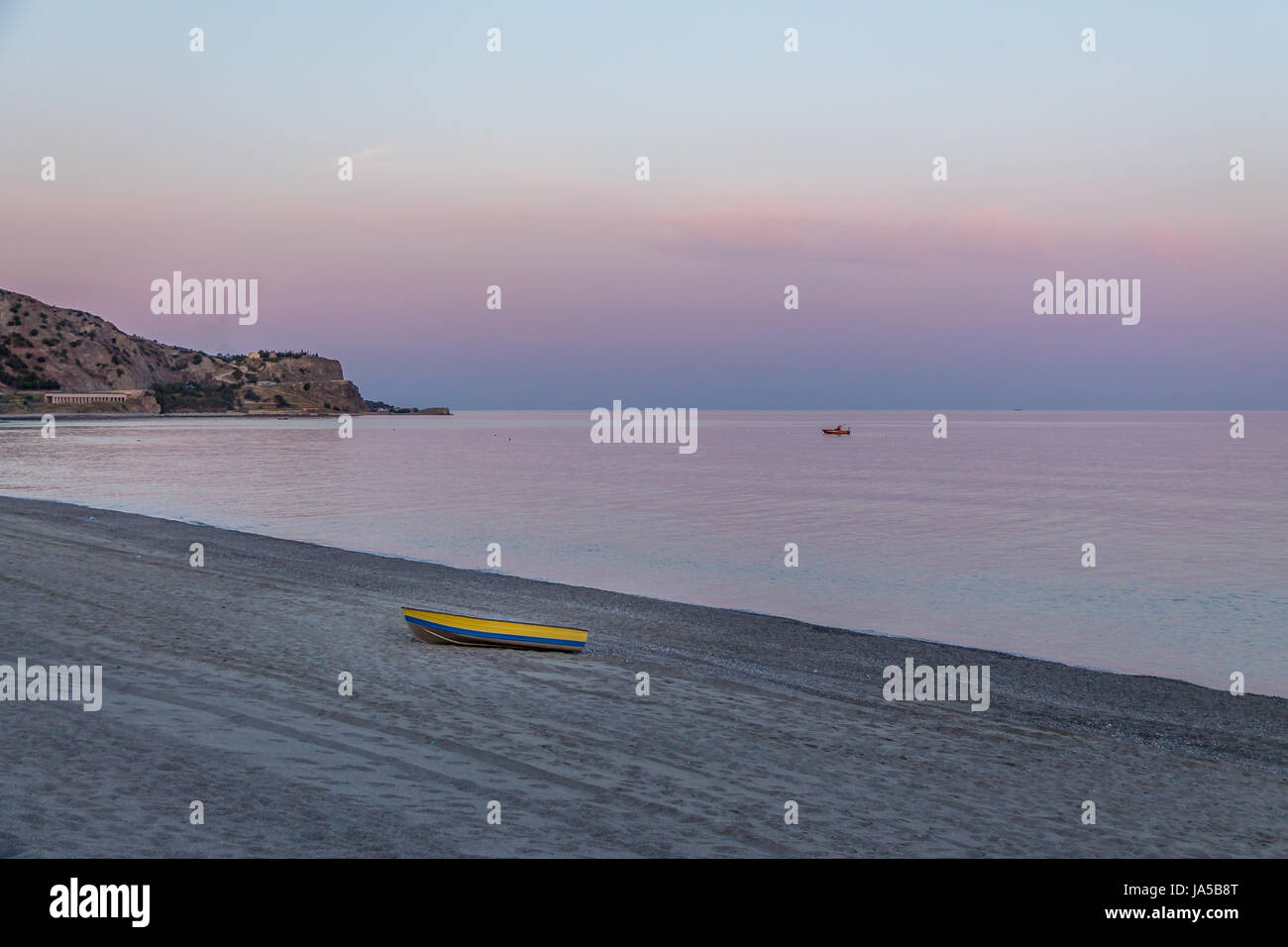 Blue and Yellow boat in a Mediterranean beach of Ionian Sea - Bova ...