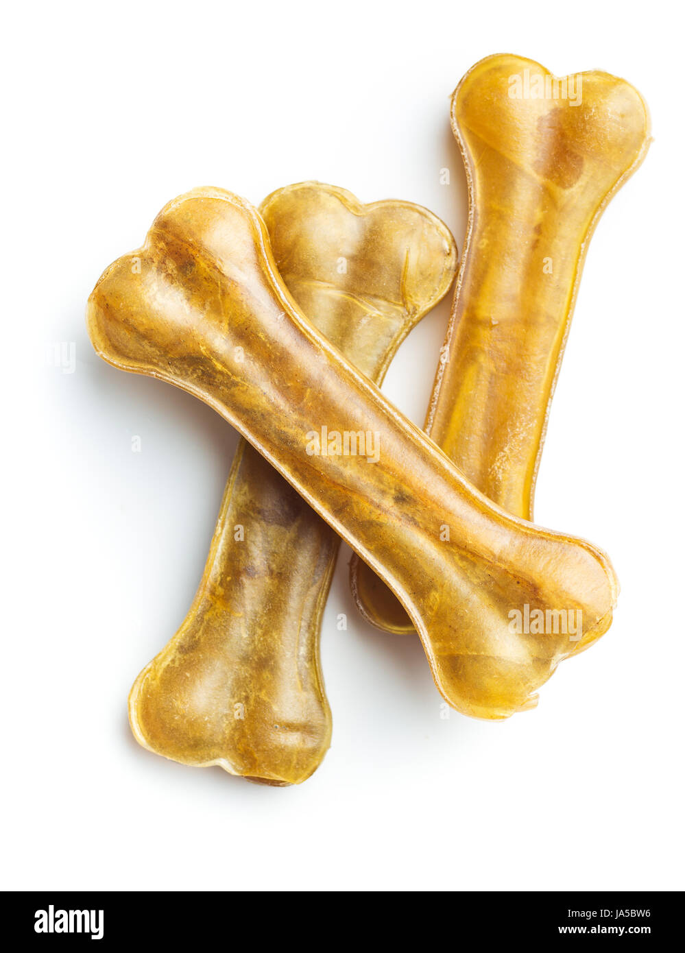 Dog chew bone isolated on white background Stock Photo - Alamy