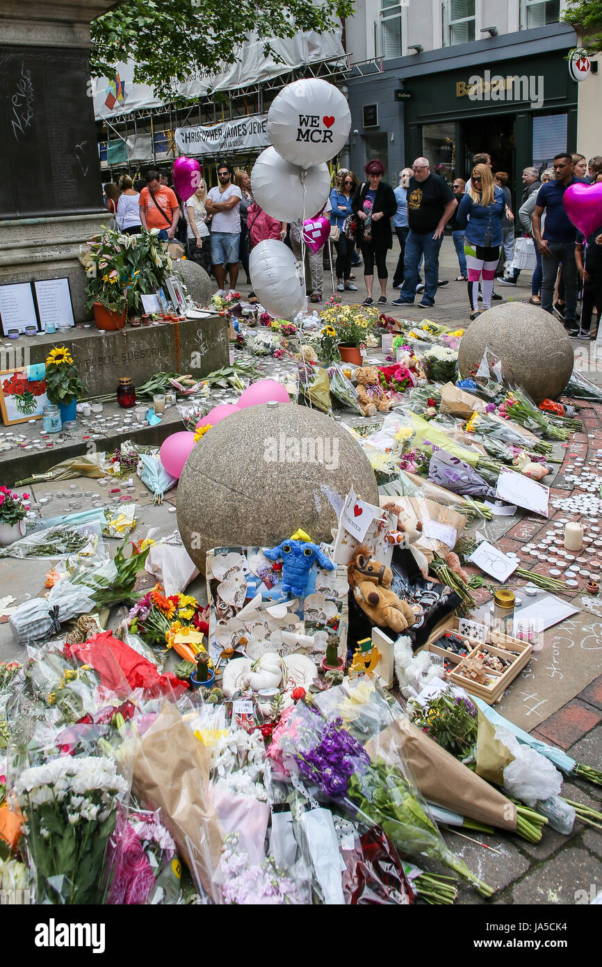 Flower and balloon tributes left in St Ann's Square Manchester to the ...