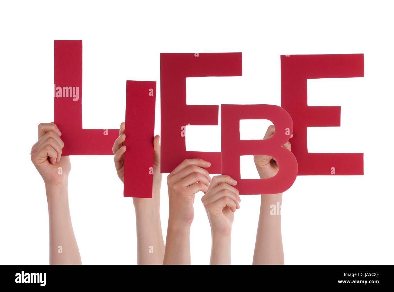 Many Persons Holding the German Word Liebe Which Means Love, Isolated ...