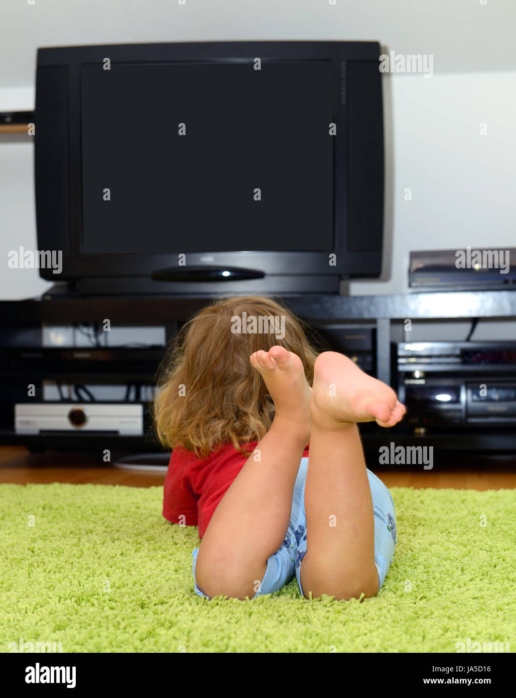 child is watching tv Stock Photo - Alamy