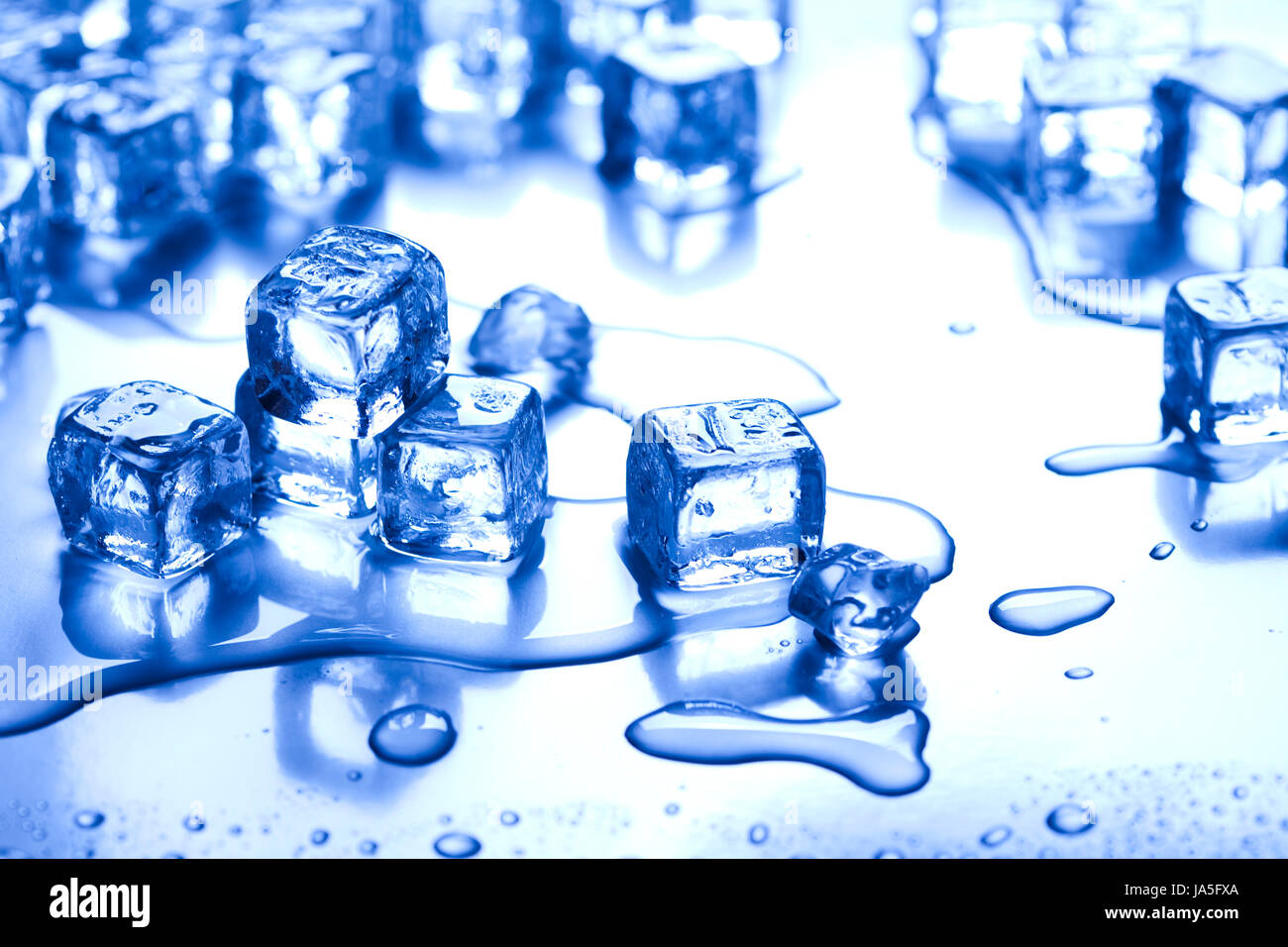 Blue and shiny ice cubes Stock Photo - Alamy