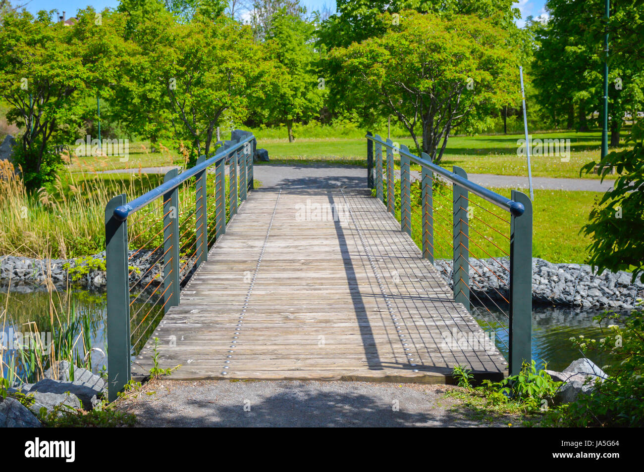 The green bridge in the park of Canada Stock Photo - Alamy