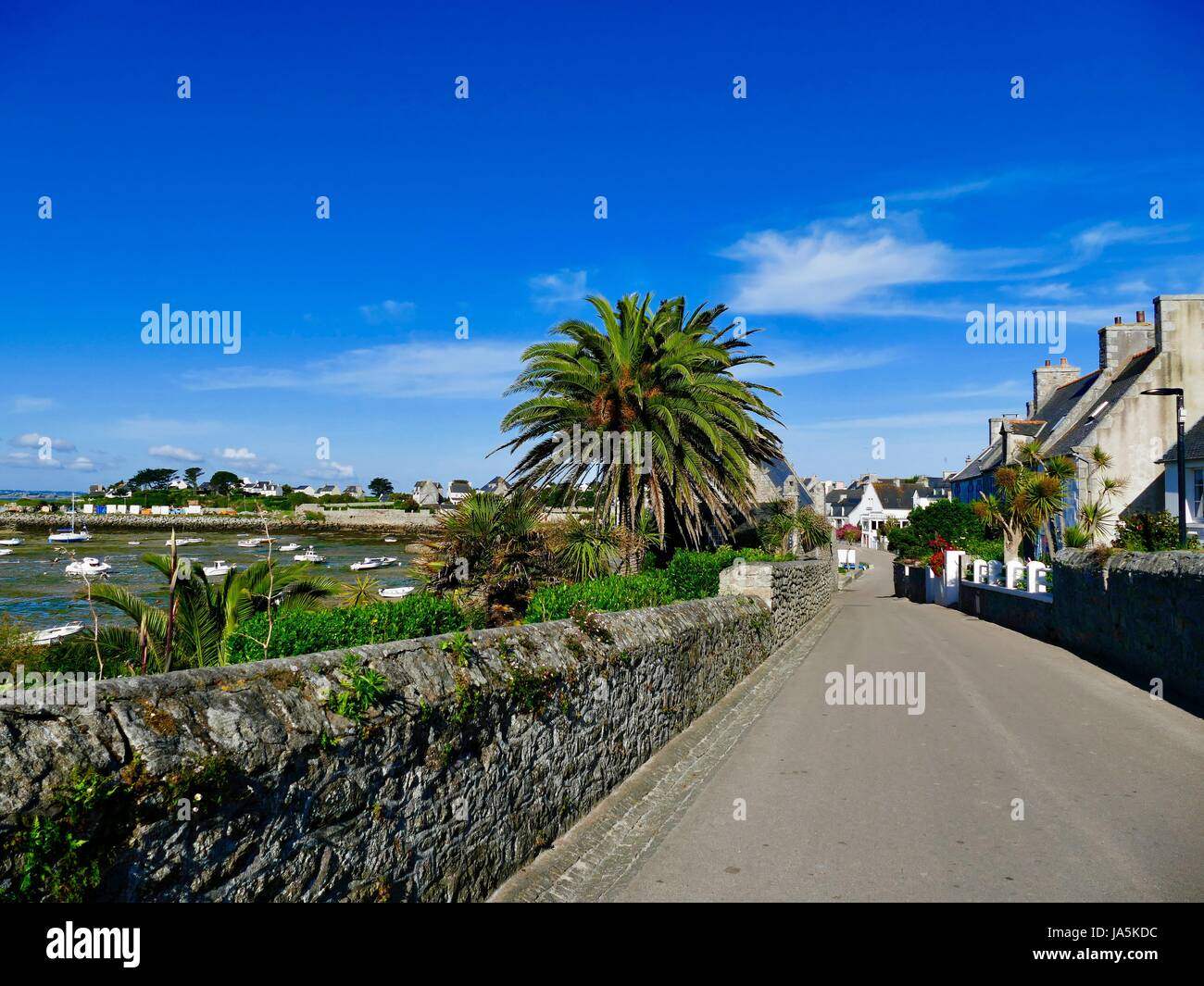 Harbor, narrow land and cottages on Batz Island, Île de Batz, France, a ...