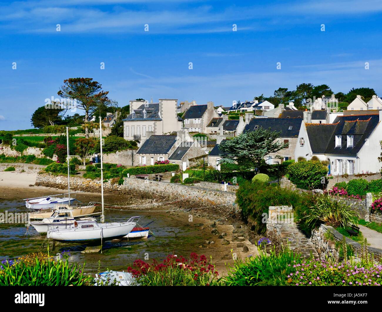 Cottages along the shoreline of Île de Batz, France in northwestern ...