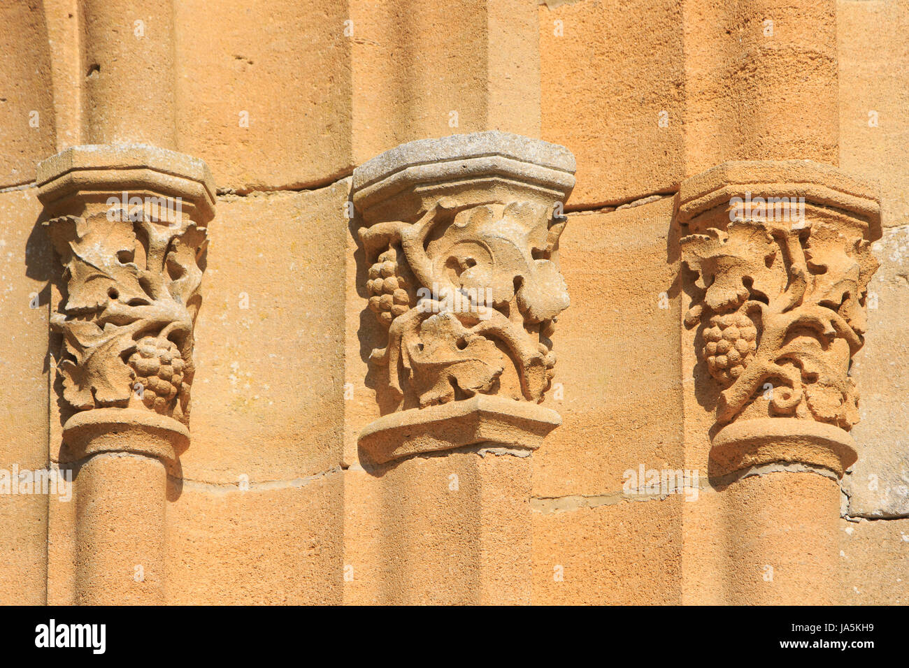 Sculpted entwined vines and grapes decorating the main entrance doorway ...