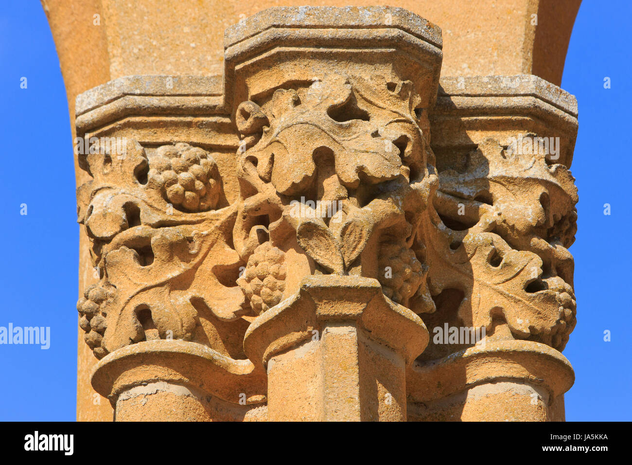 Sculpted entwined vines and grapes decorating the main entrance doorway ...