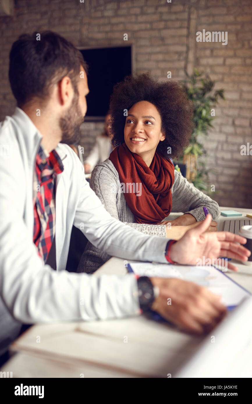 Business people brainstorming on project hi-res stock photography and ...