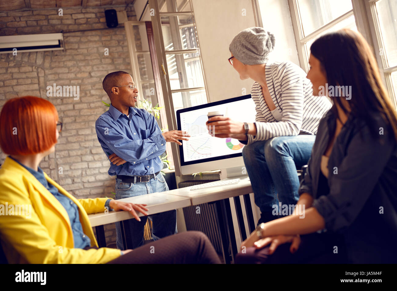 Supervisor talking employees hi-res stock photography and images - Alamy