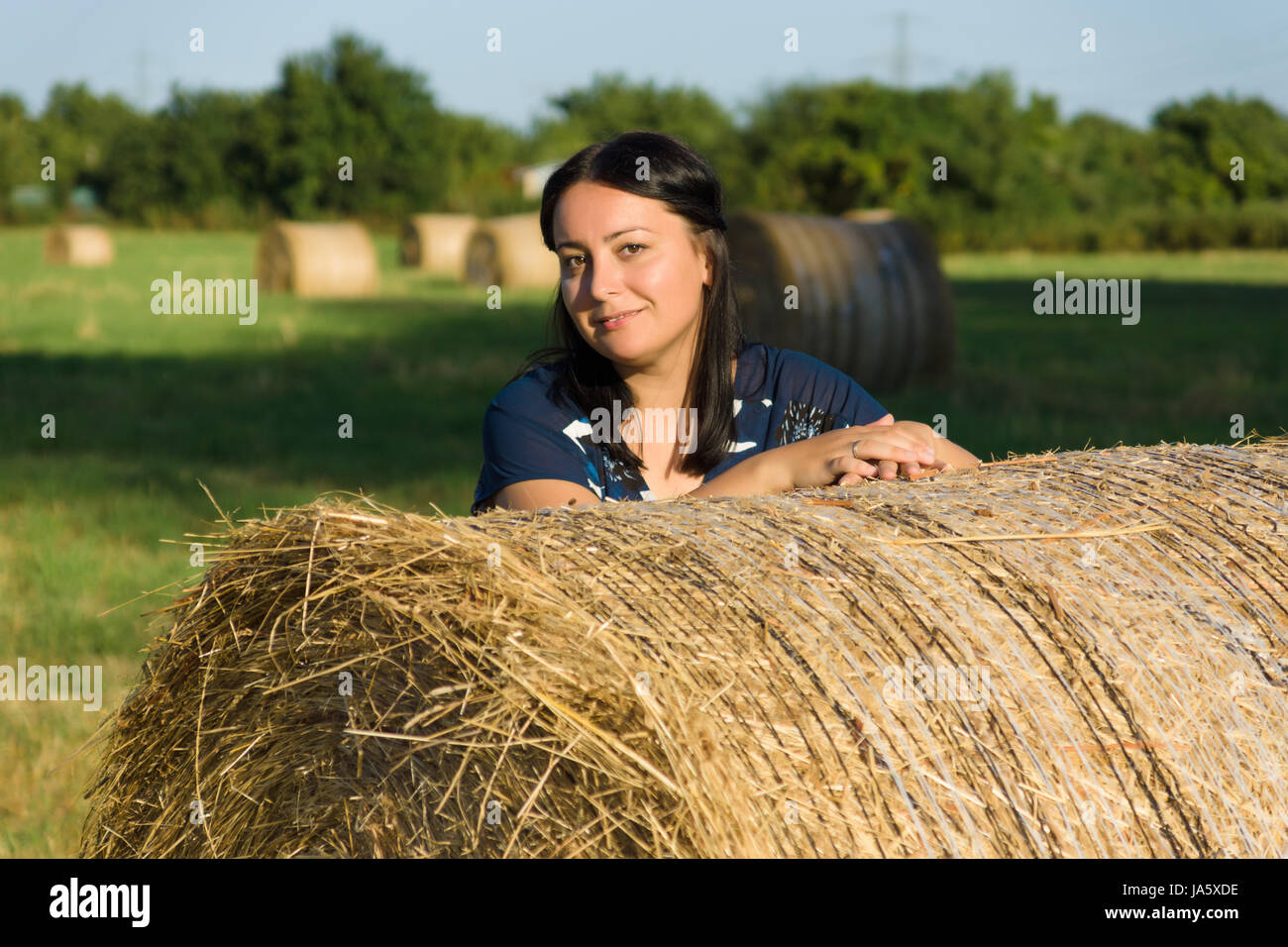 woman, stack, straw, humans, human beings, people, folk, persons, human ...