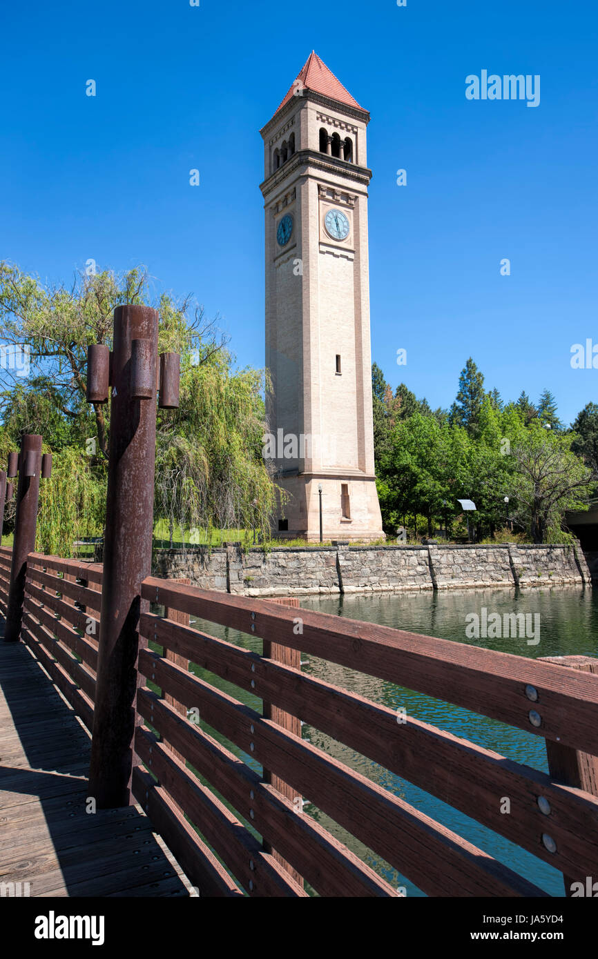 The railing of a bridge leading to the famous clock tower in Riverfront ...
