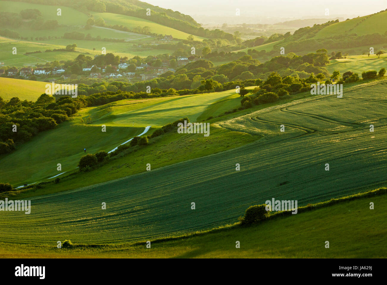 Spring sunset on the South Downs in East Sussex, England Stock Photo ...