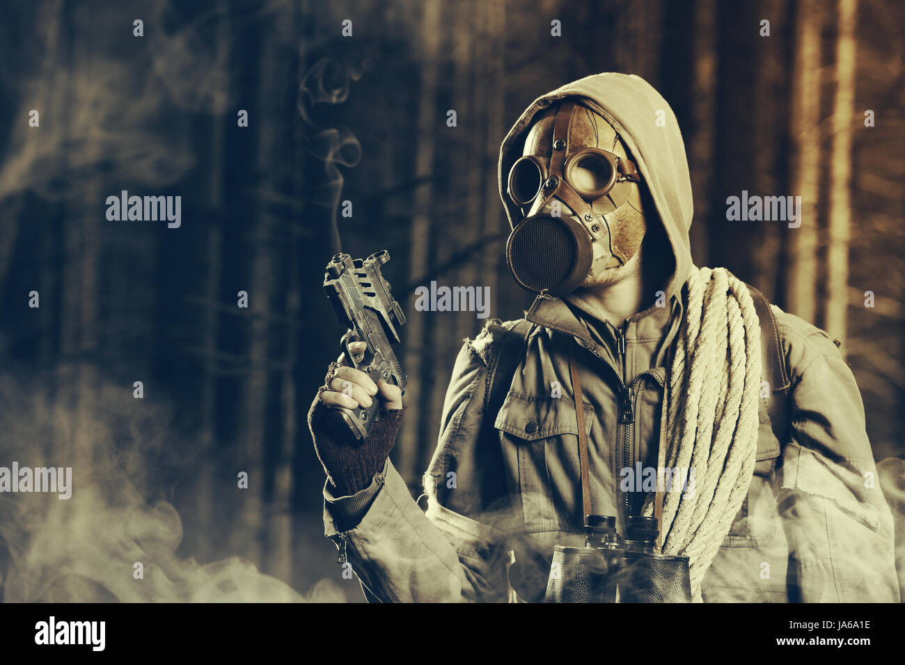 A soldier wearing gas mask is fighting in the forest Stock Photo - Alamy