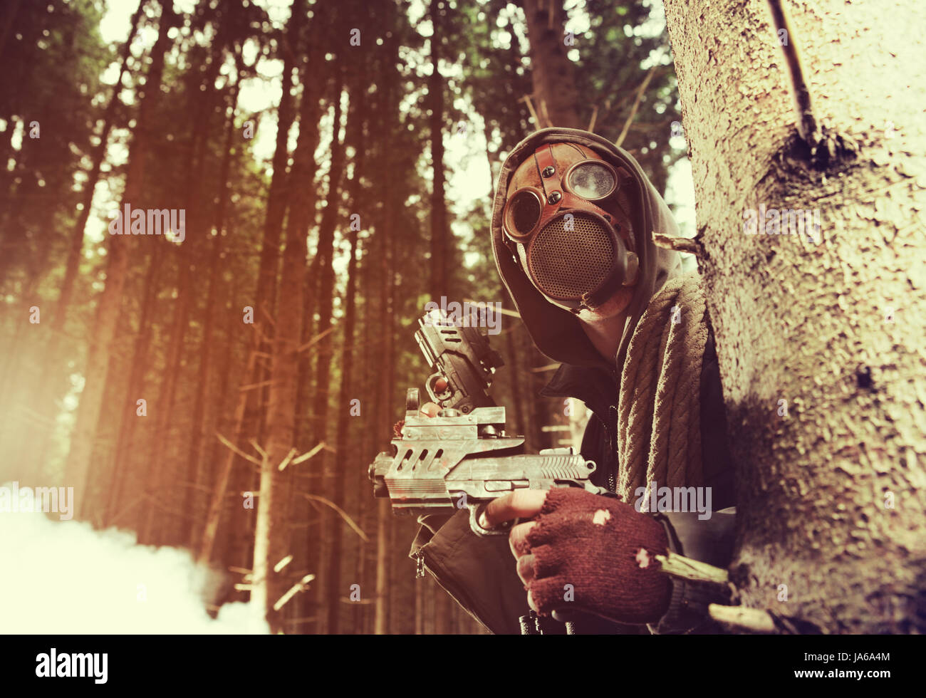 Soldier wearing a gas mask is fighting for its survival Stock Photo - Alamy
