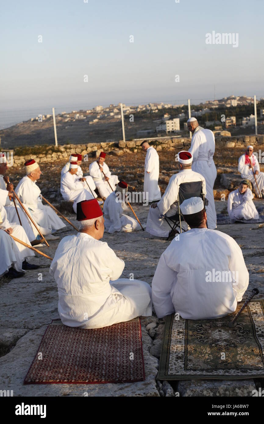 Samaritans participate in a traditional ceremony celebrating the giving ...