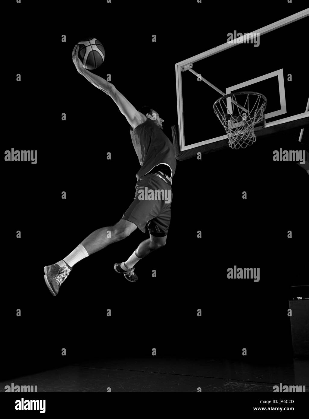 Basketball Players Dunking Over People