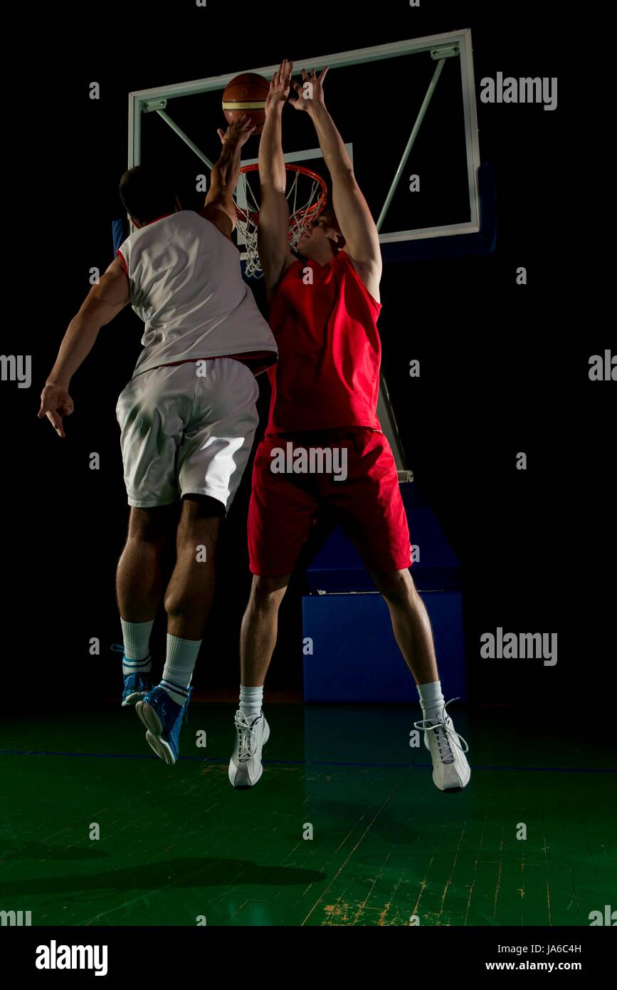 basketball game sport player in action isolated on black background ...