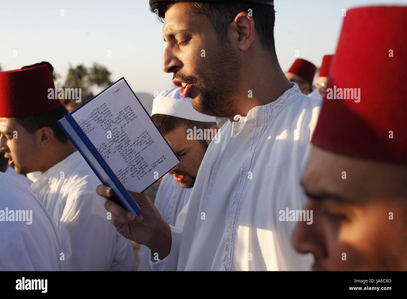 Samaritans participate in a traditional ceremony celebrating the giving ...
