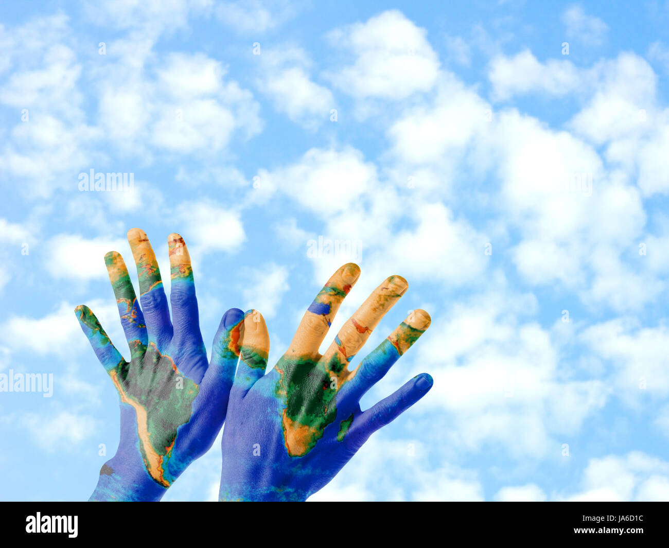 World map painted on hands hi-res stock photography and images - Alamy