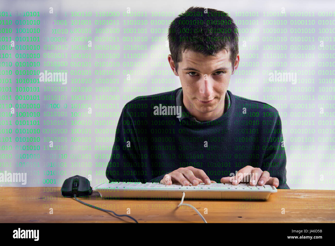 young man using the computer, programmer with lines of code Stock Photo ...