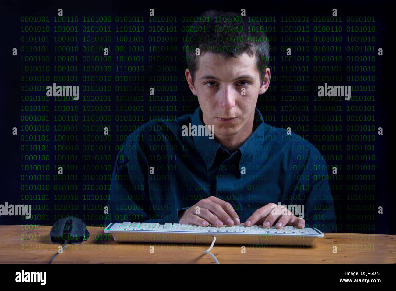 young man using the computer, programmer with lines of code Stock Photo ...