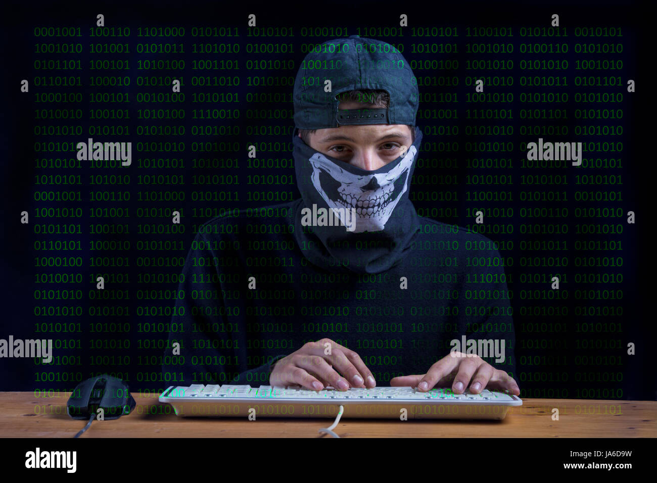 hacker using the computer, young man using the computer, programmer ...