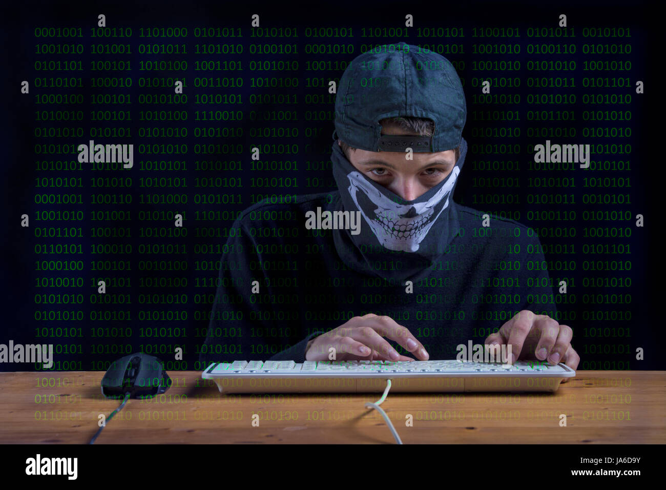 hacker using the computer, young man using the computer, programmer ...