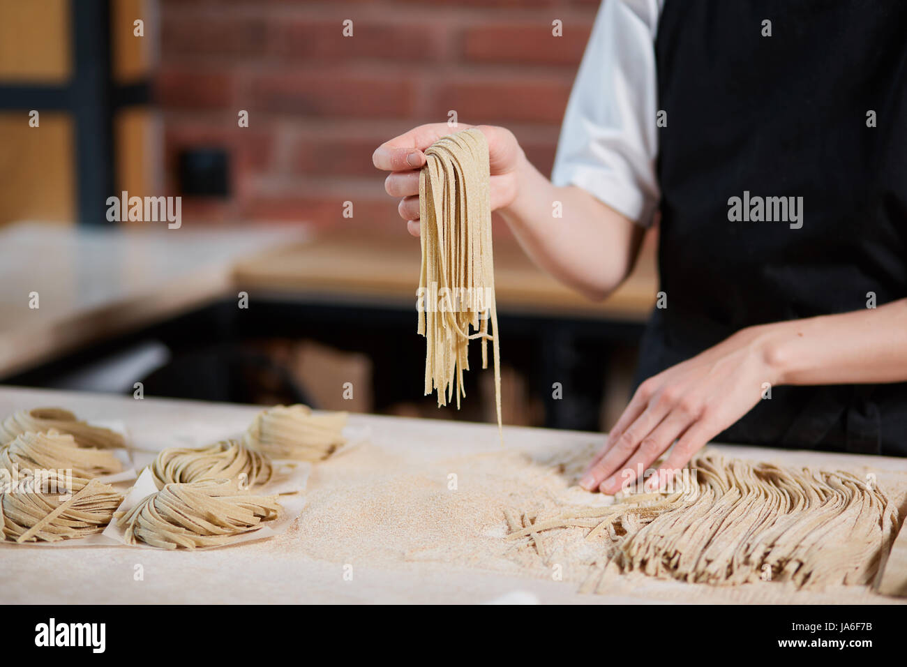 Crop unrecognizable cook in hi-res stock photography and images - Alamy