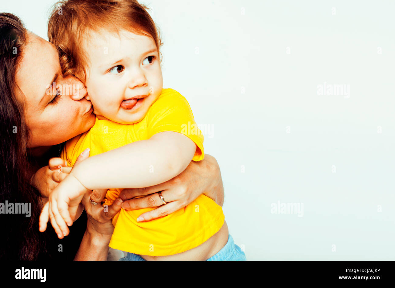 pretty real normal mother with cute blond little daughter close Stock ...