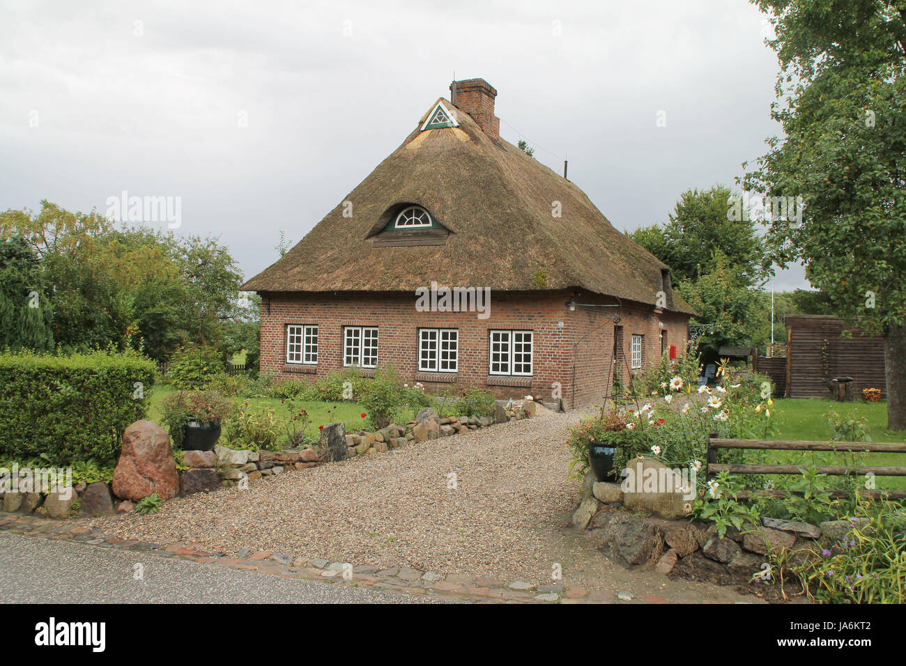 a thatched cottage Stock Photo - Alamy