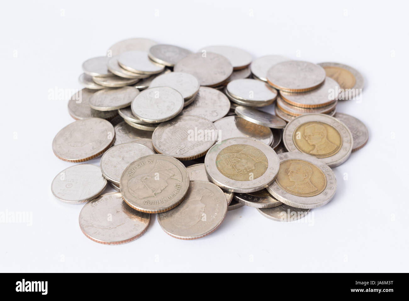 Saving money coins Stock Photo - Alamy