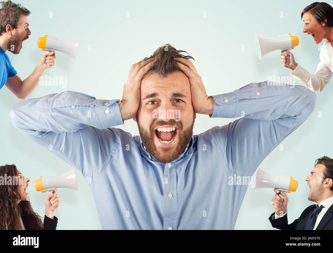 Stress concept with screaming colleagues Stock Photo - Alamy