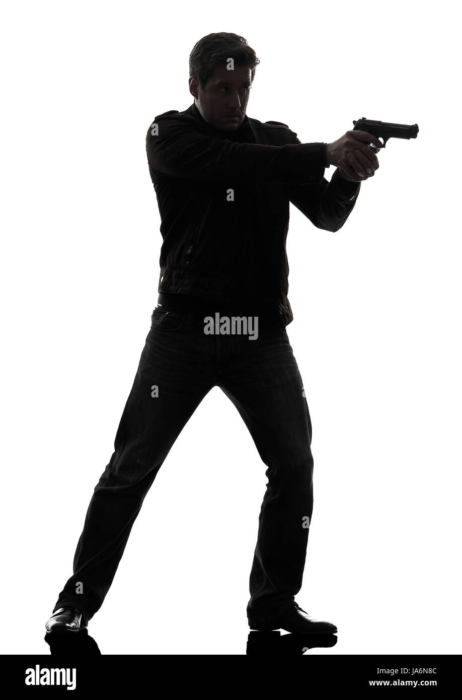 Silhouette man shooting shot gun Cut Out Stock Images & Pictures - Alamy
