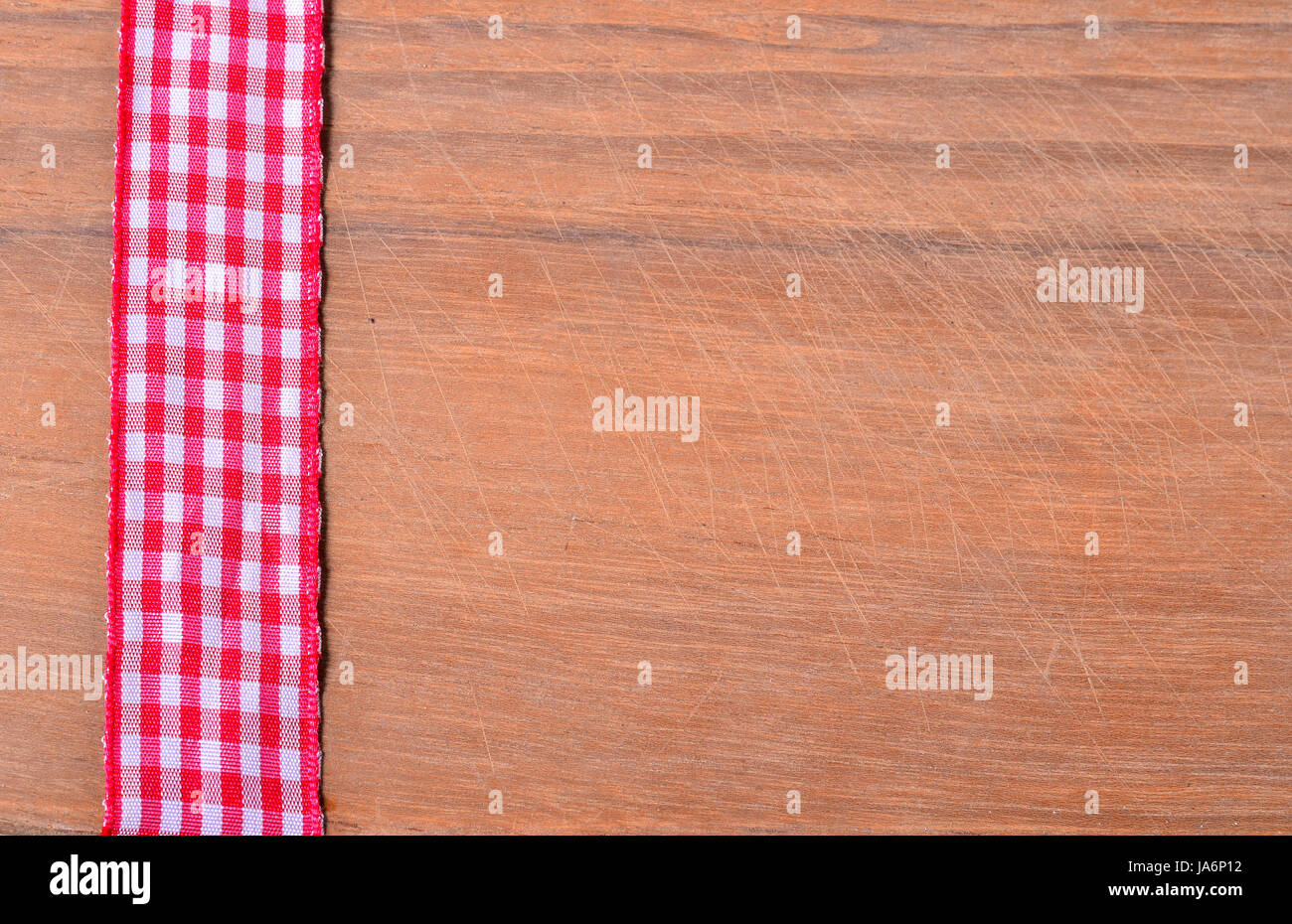 old wooden background with red ribbon Stock Photo - Alamy