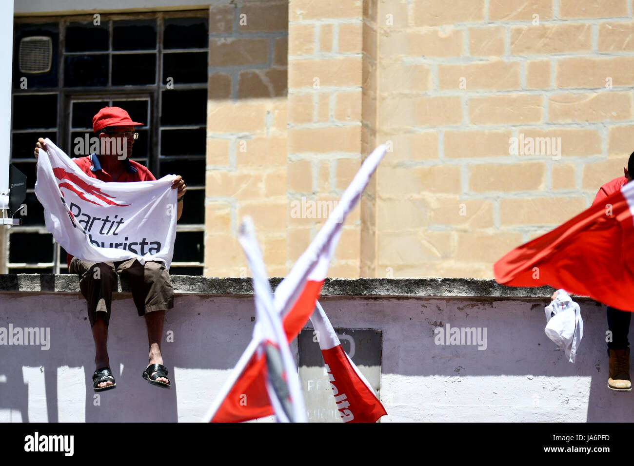 Valletta, Malta. 4th June, 2017. A Labour Party supporter celebrates ...