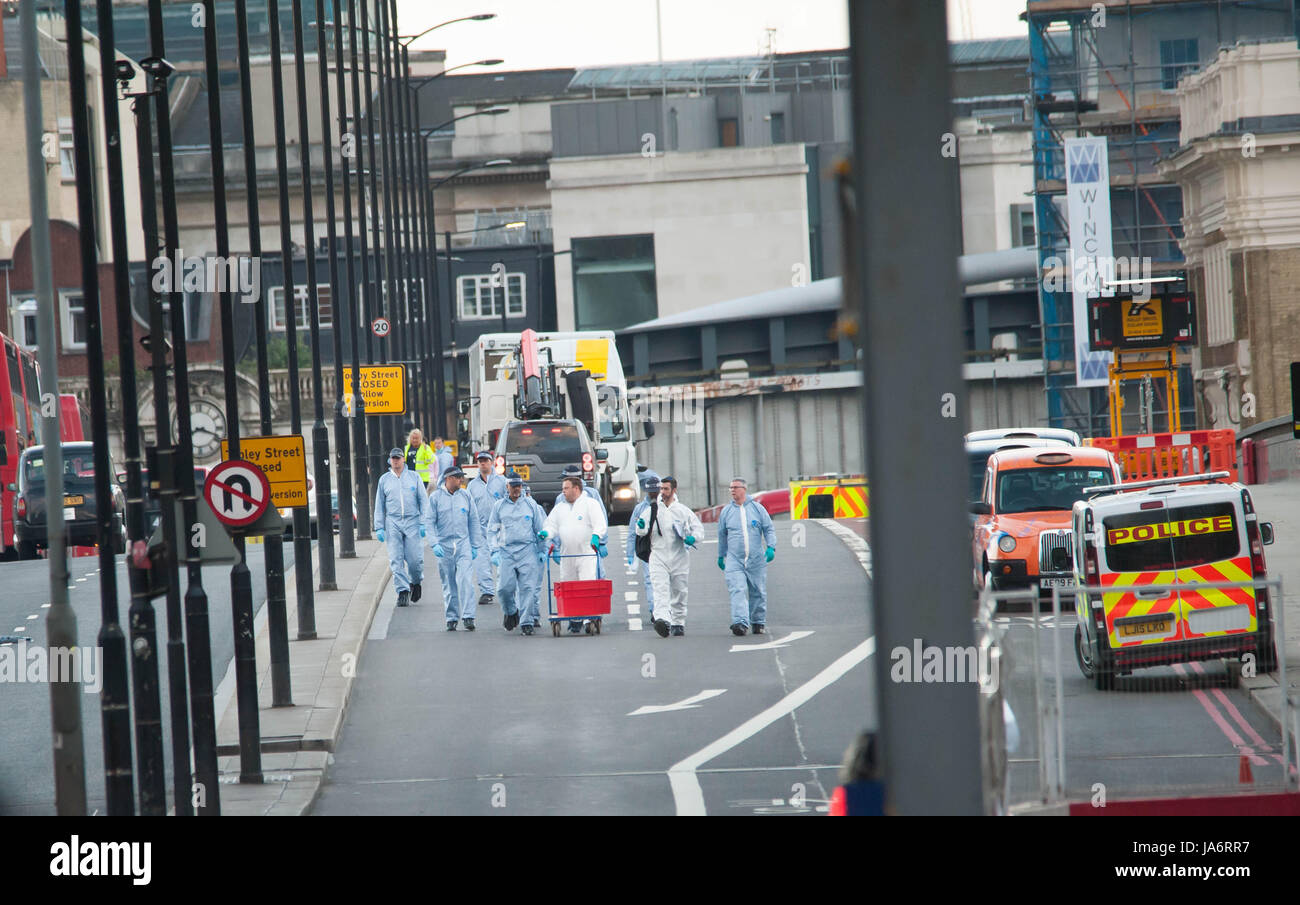 London, UK. 4th June, 2017. The white van used in the attack is loaded ...