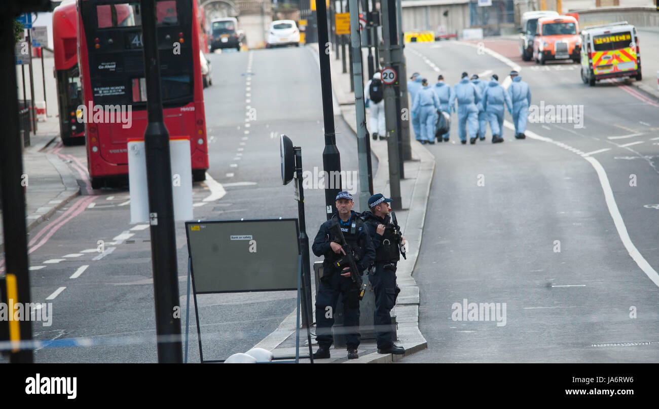 London, UK. 4th June, 2017. Police forensic officers work on London ...