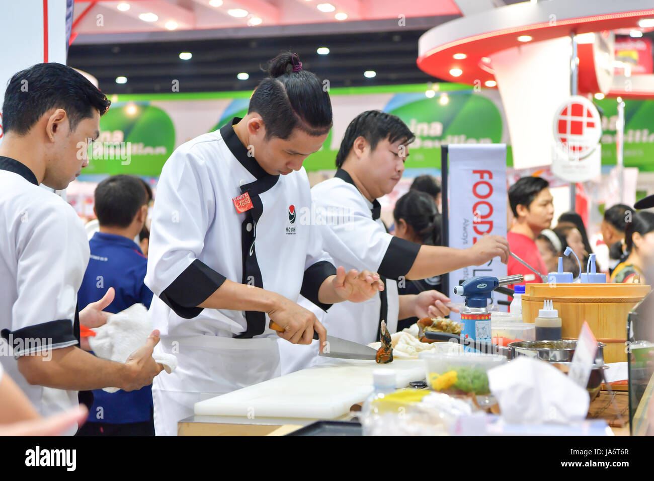 NONTHABURI - JUNE 04 : Chefs are cooking demonstrations to visitors and ...
