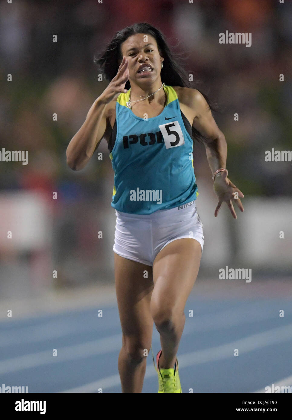 Ariyonna Augustine of Long Beach Poly wins the girls 200m in a wind ...