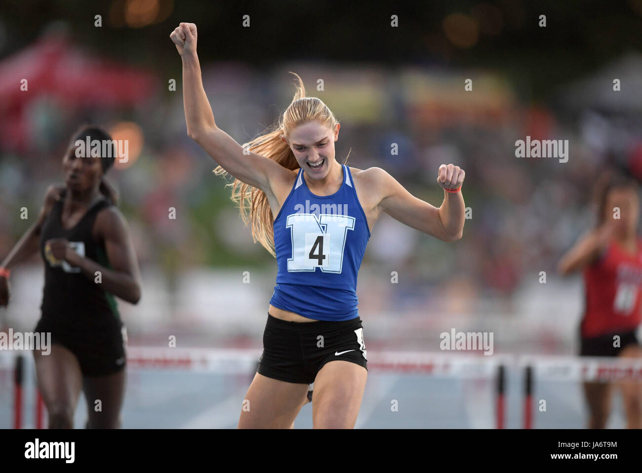 Shae Anderson of Norco celebrates after winning the girls 300m hurdles ...