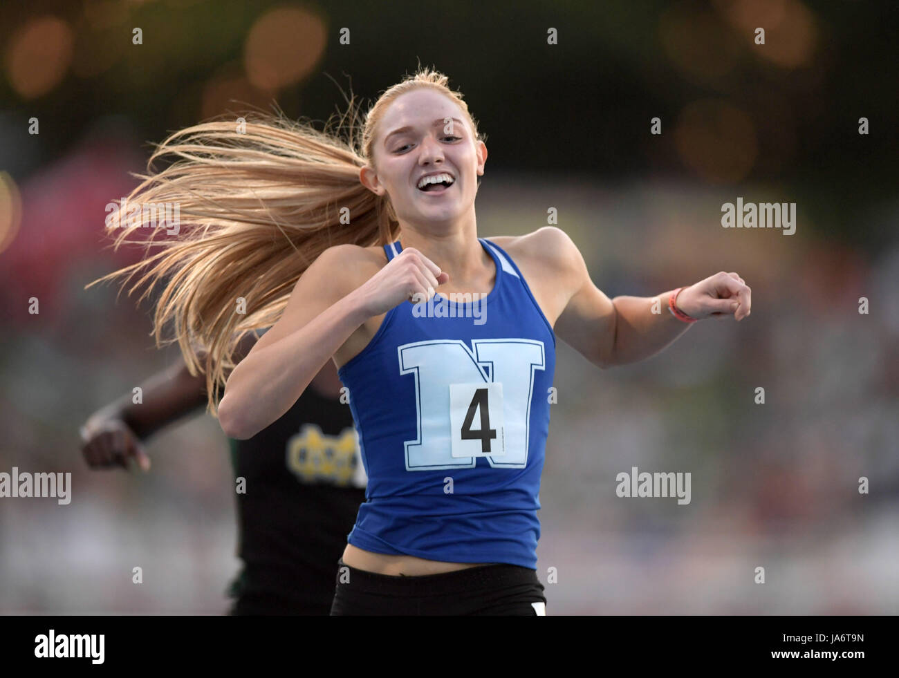 Shae Anderson of Norco celebrates after winning the girls 300m hurdles ...